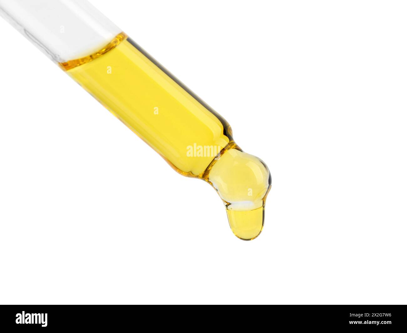Dripping tincture from pipette isolated on white Stock Photo - Alamy