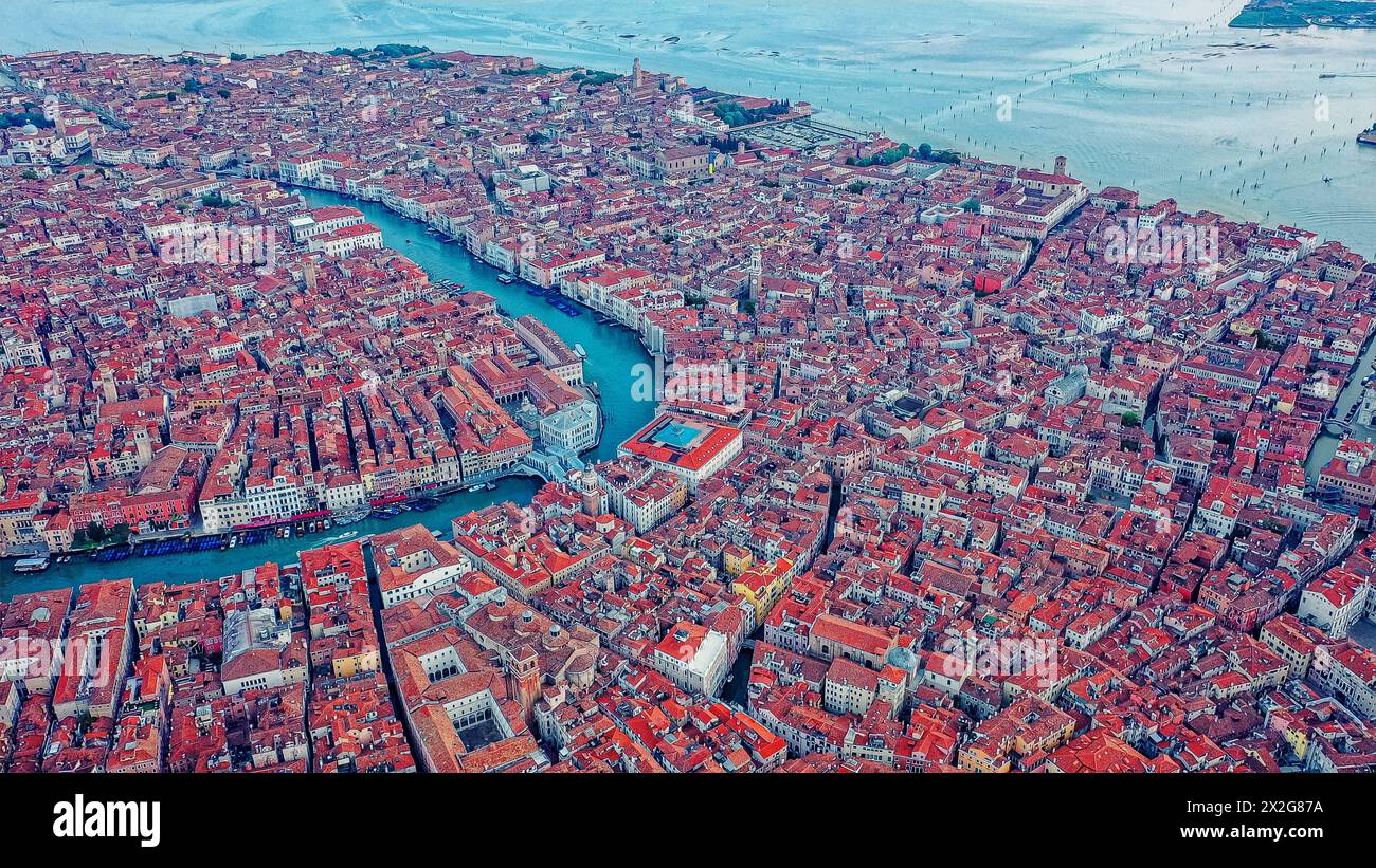 Aerial urban design with river flowing through it creating natural ...