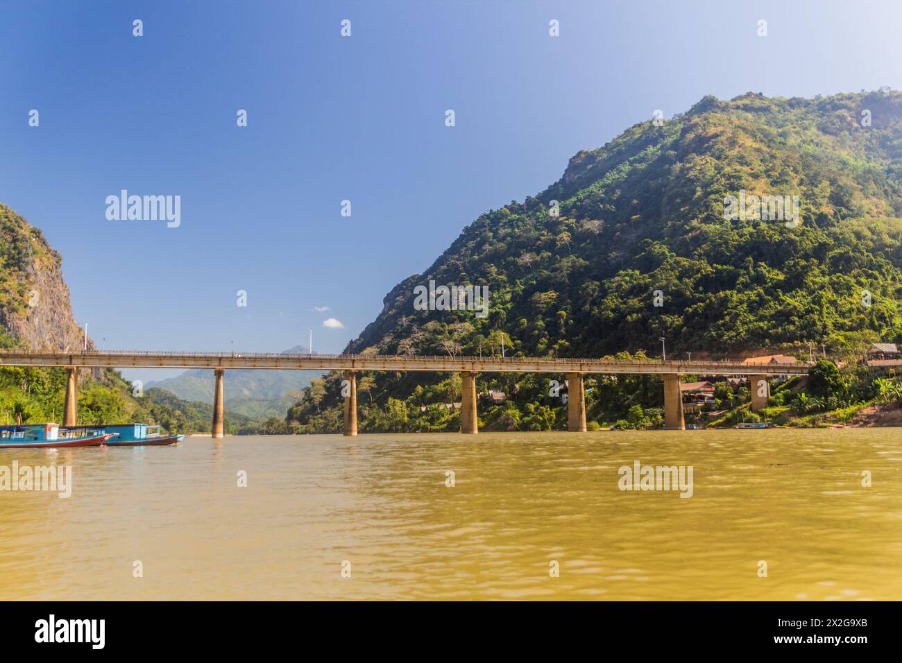 Bridge across Nam Ou river in Nong Khiaw, Laos Stock Photo - Alamy