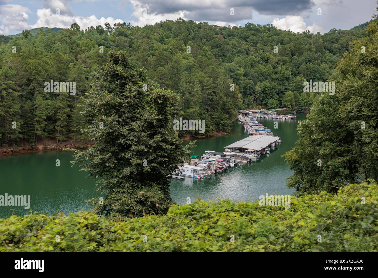 View of a marina on Fontana Lake as seen from the open air car of the ...
