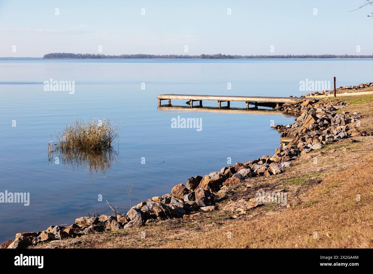 Small wooden dock and boat ramp on Lake Seminole at the Corps of ... Small wooden dock and boat ramp on Lake Seminole at the Corps of ...