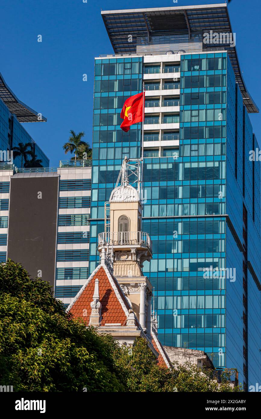 Vietnam, Ho Chi Minh City, Saigon, Buildings and Flag Stock Photo - Alamy