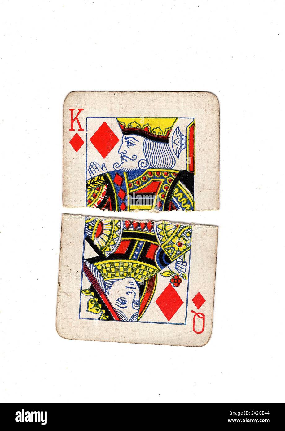 Torn halves of vintage playing cards showing a queen and king of ...