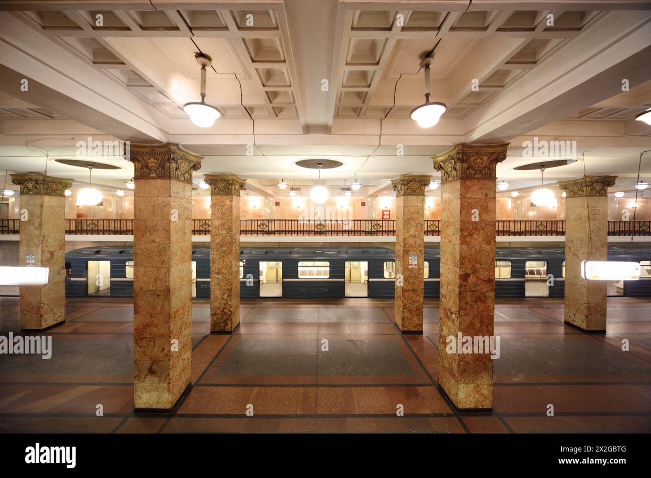 people come in wagons, subway station, marble white columns, granite ...
