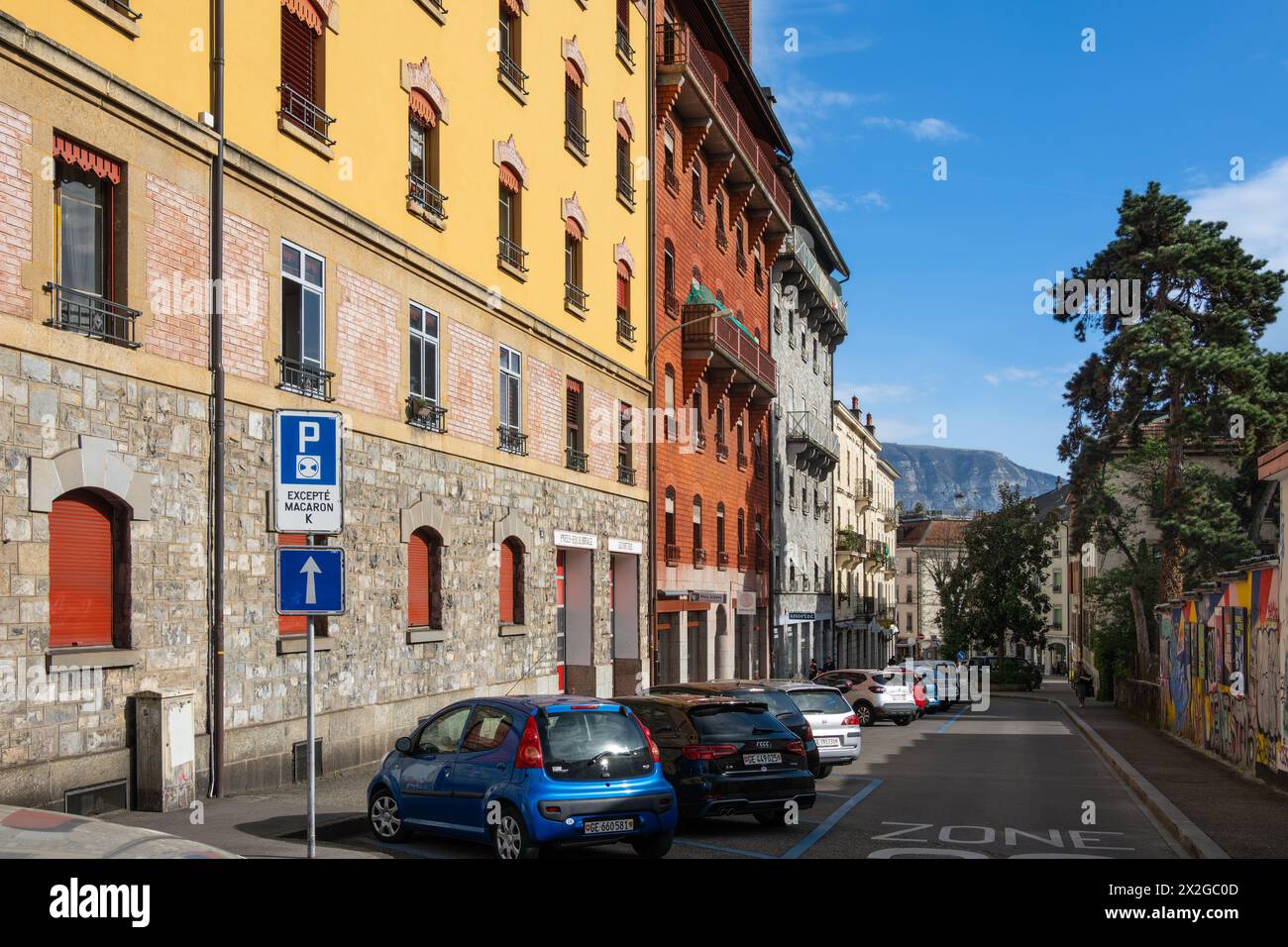 Geneva, Switzerland - April 5, 2024: Street in Geneva, old houses with ...