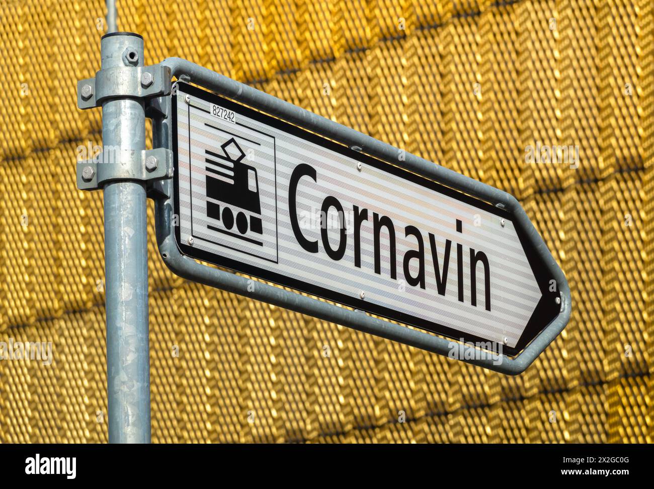 Traffic signboard with arrow showing the direction of the railway ...