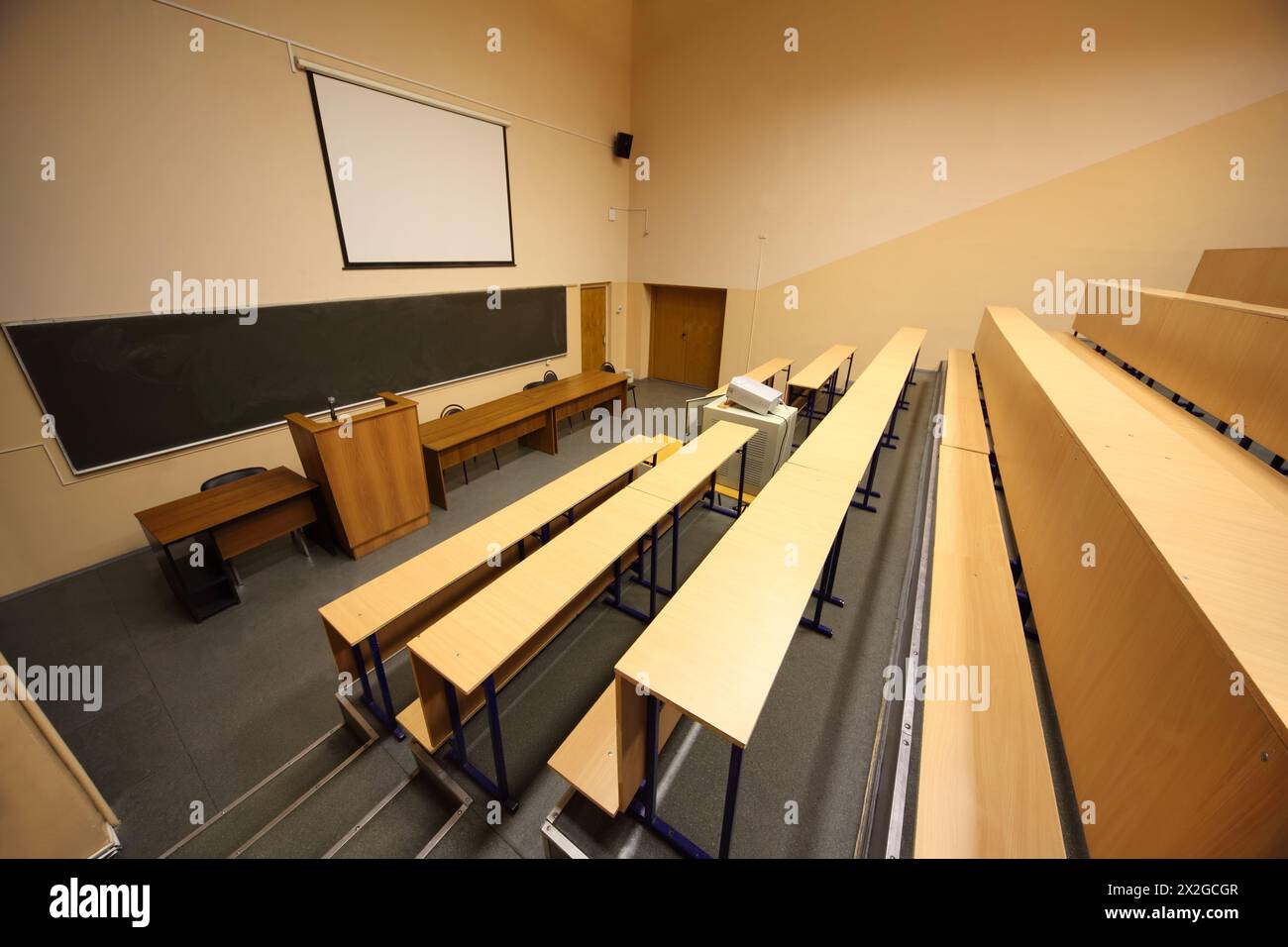 Large classroom, university lecture hall; big blackboard and background ... Large classroom, university lecture hall; big blackboard and background ...