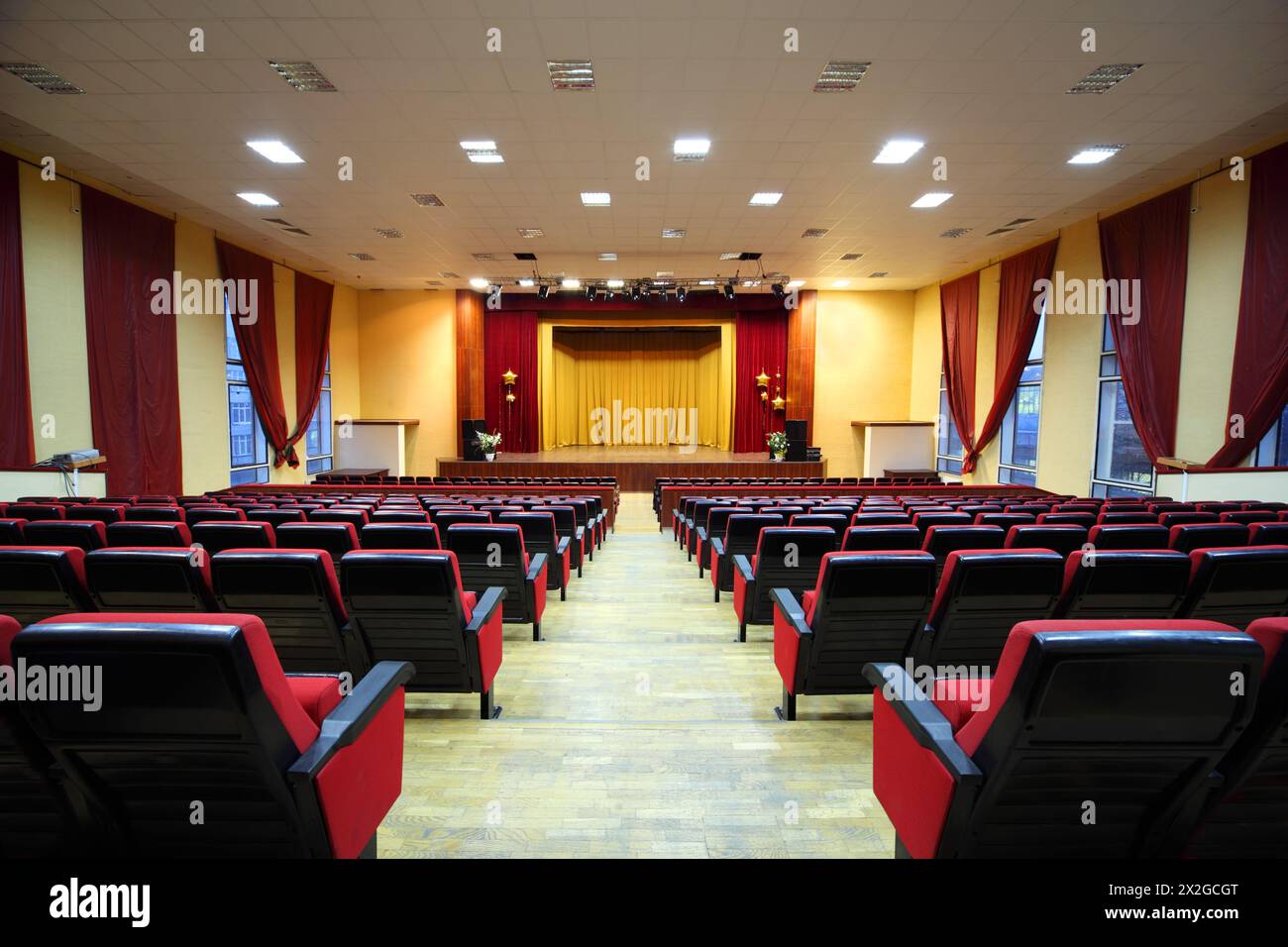 Concert hall and empty stage, many rows of red seats and stage Stock ...