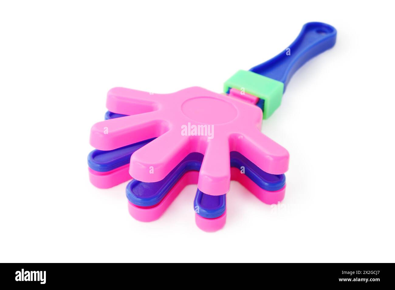 colorful plastic toy hand for welcome, blue, pink and green colors ...