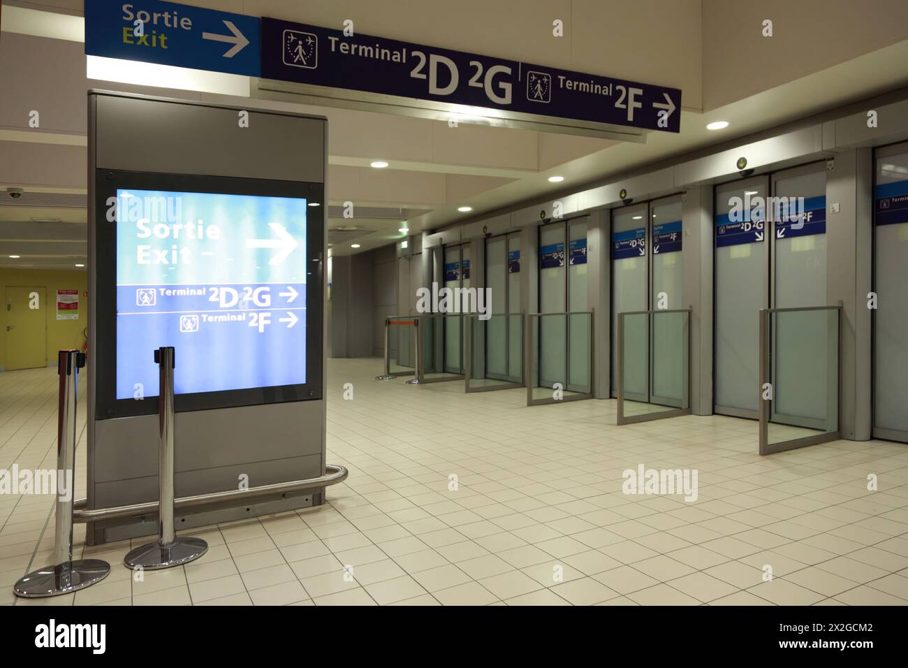 Exit to terminals at the airport Stock Photo - Alamy