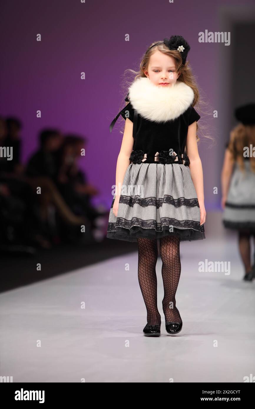 MOSCOW - FEBRUARY 22: Unidentified beautiful child model wear dress ...