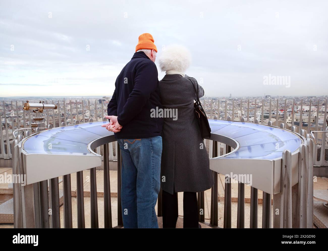 PARIS - JANUARY 2: Couple stands on Arc de Triomphe on January 2, 2010 ...