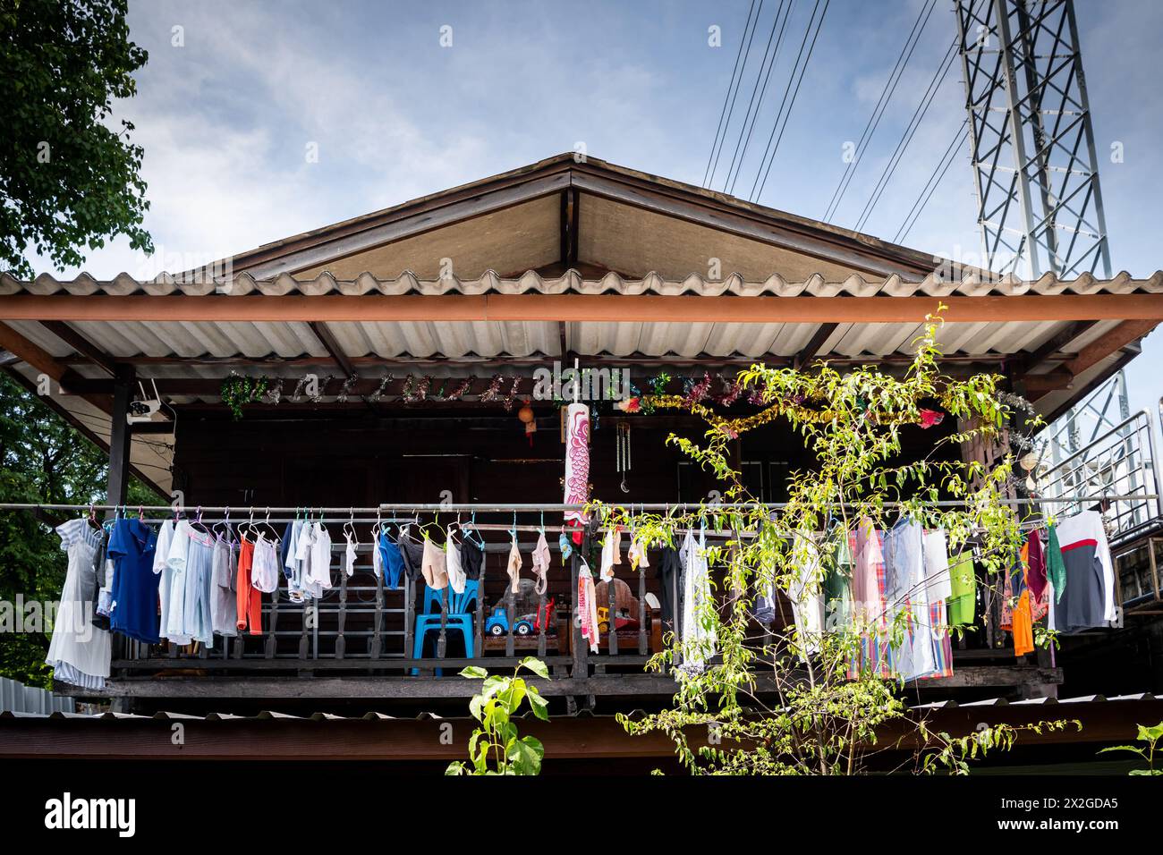 Washing hanging up outside a Thai house in Bangkok, Thailand Stock ...