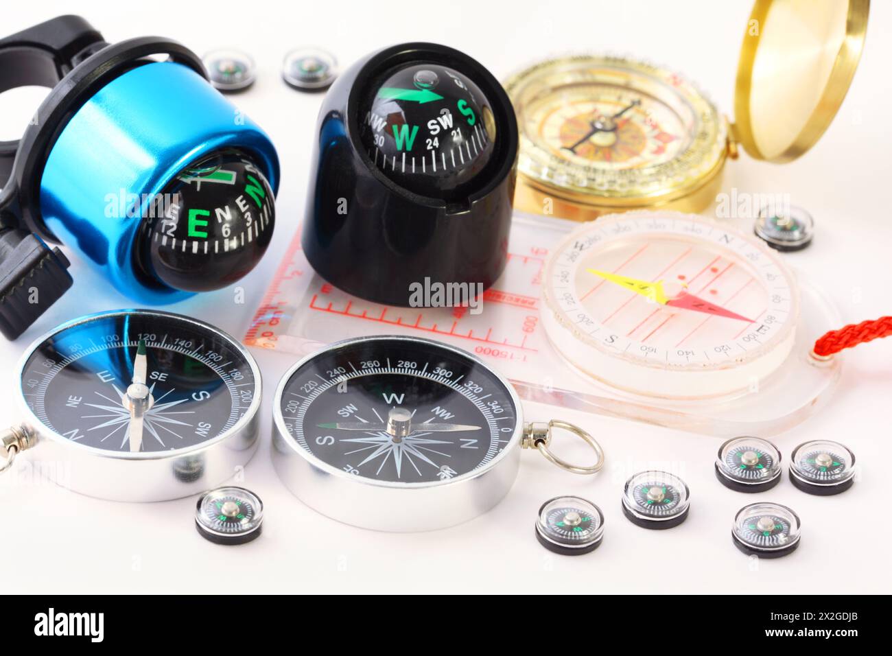 Fifteen different multi-colored compasses - golden vintage compass ...