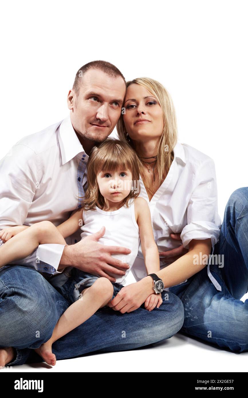 Parents holding daughter white shirts hi-res stock photography and images - Alamy