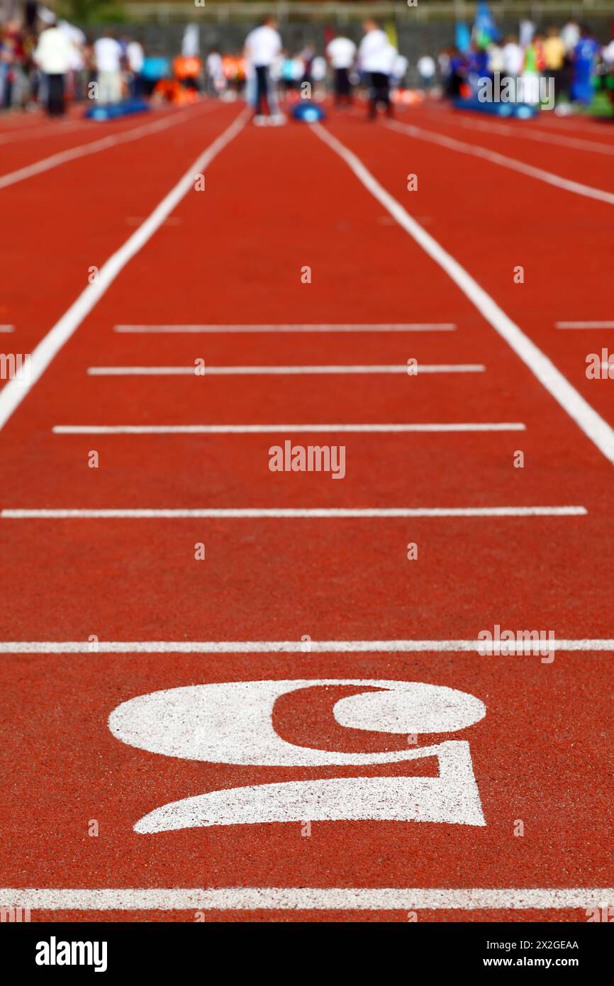 Running Track 5; perspective; special red cover for racing; people are ...