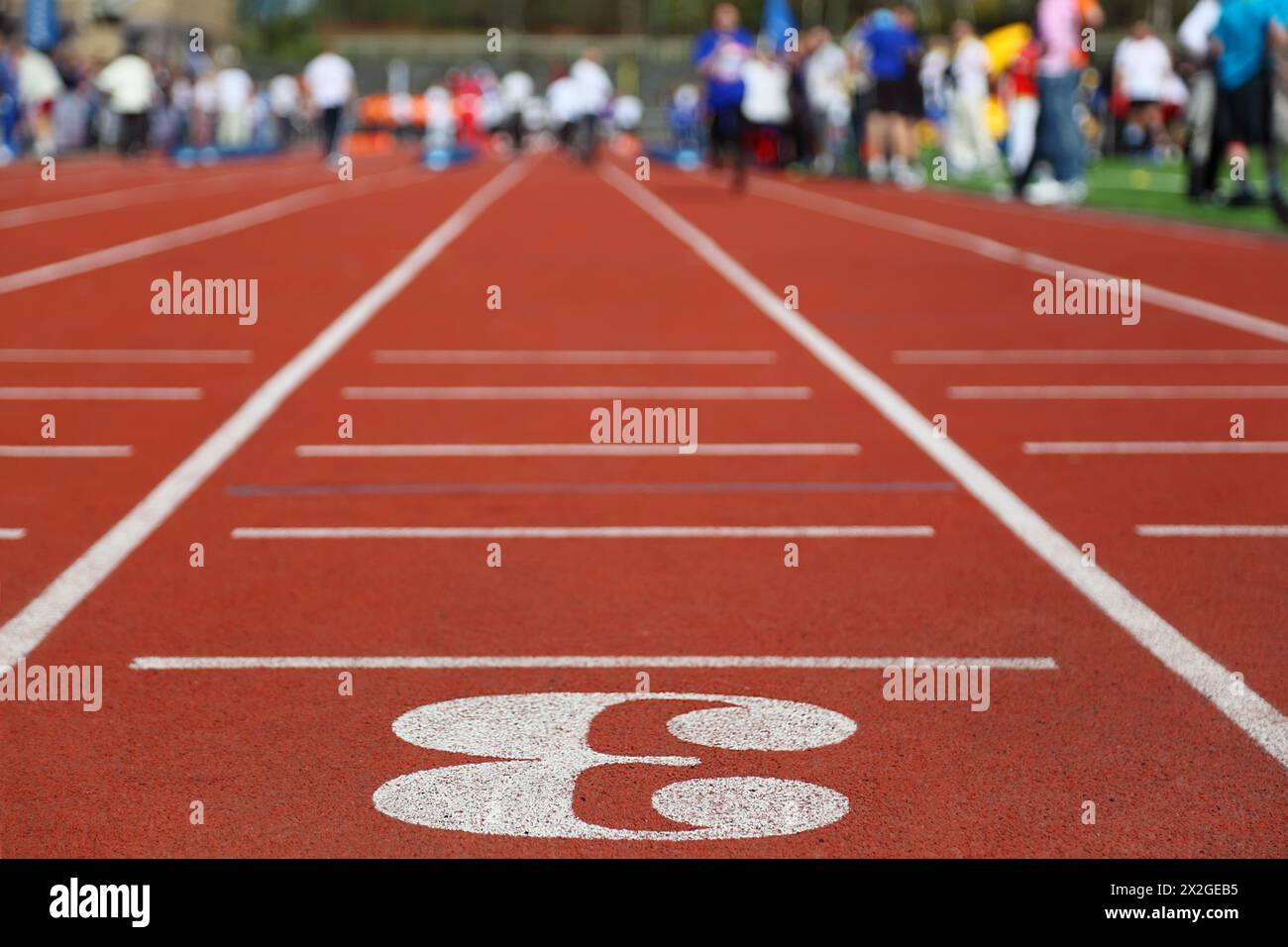 Running Track 3; perspective; red cover for racing; people are far away ...