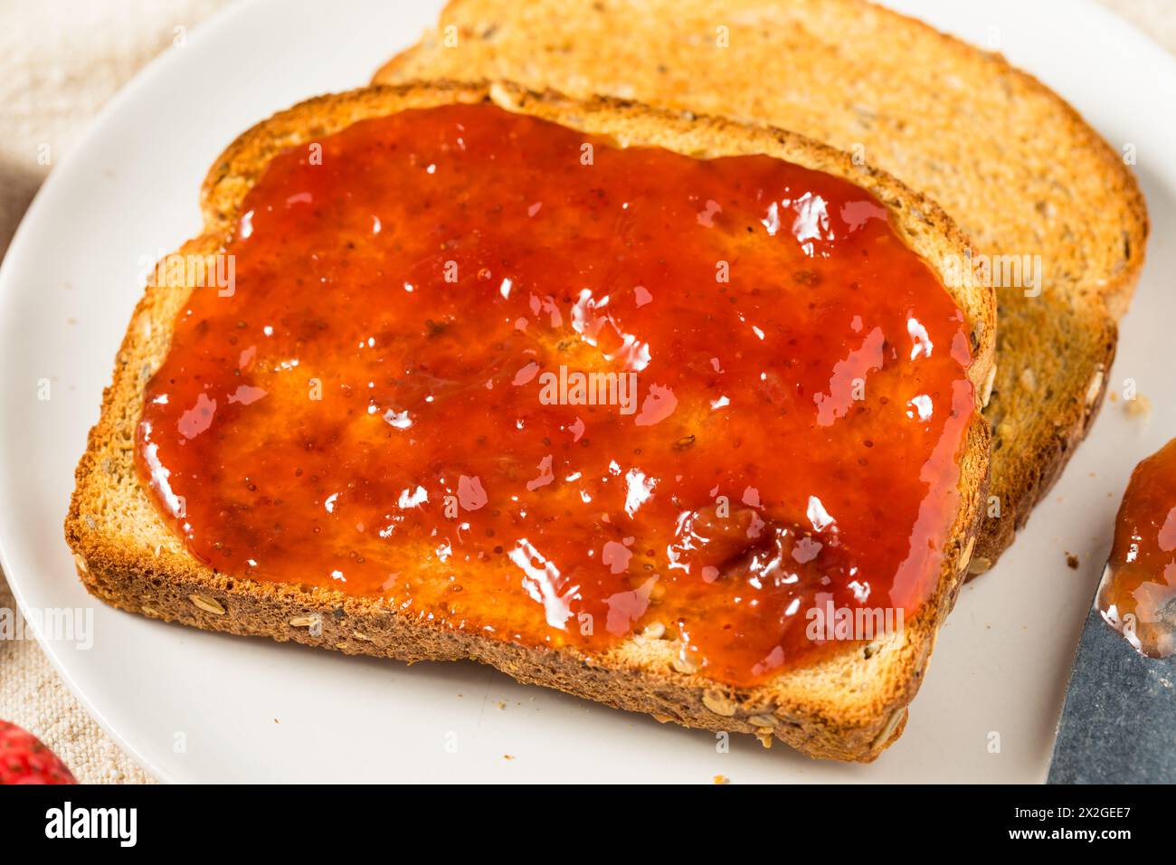 Healthy Strawberry Jam on Toast for Breakfast Stock Photo - Alamy