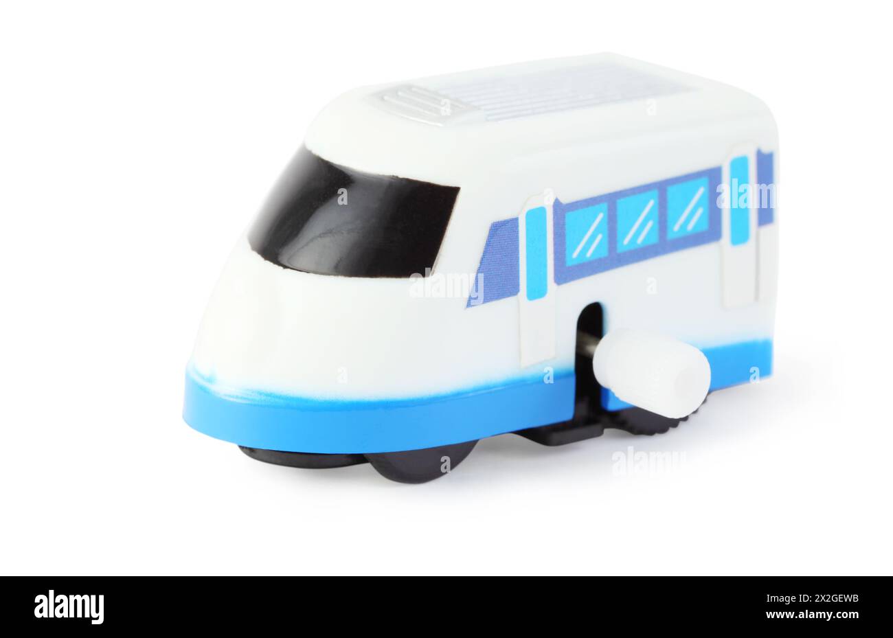 bright clockwork toy white train with blue windows on white background ...