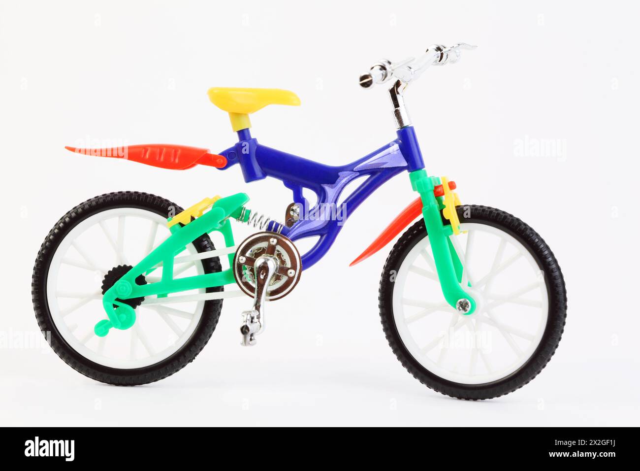 colorful plastic toy two-wheeled bicycle on white background Stock ...