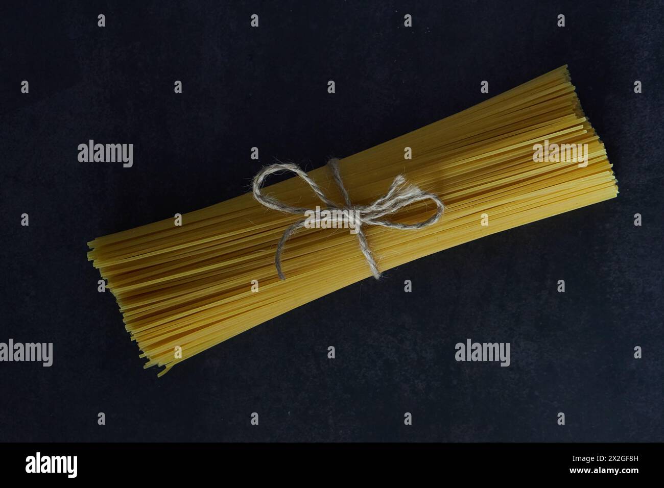 Black string hi-res stock photography and images - Alamy