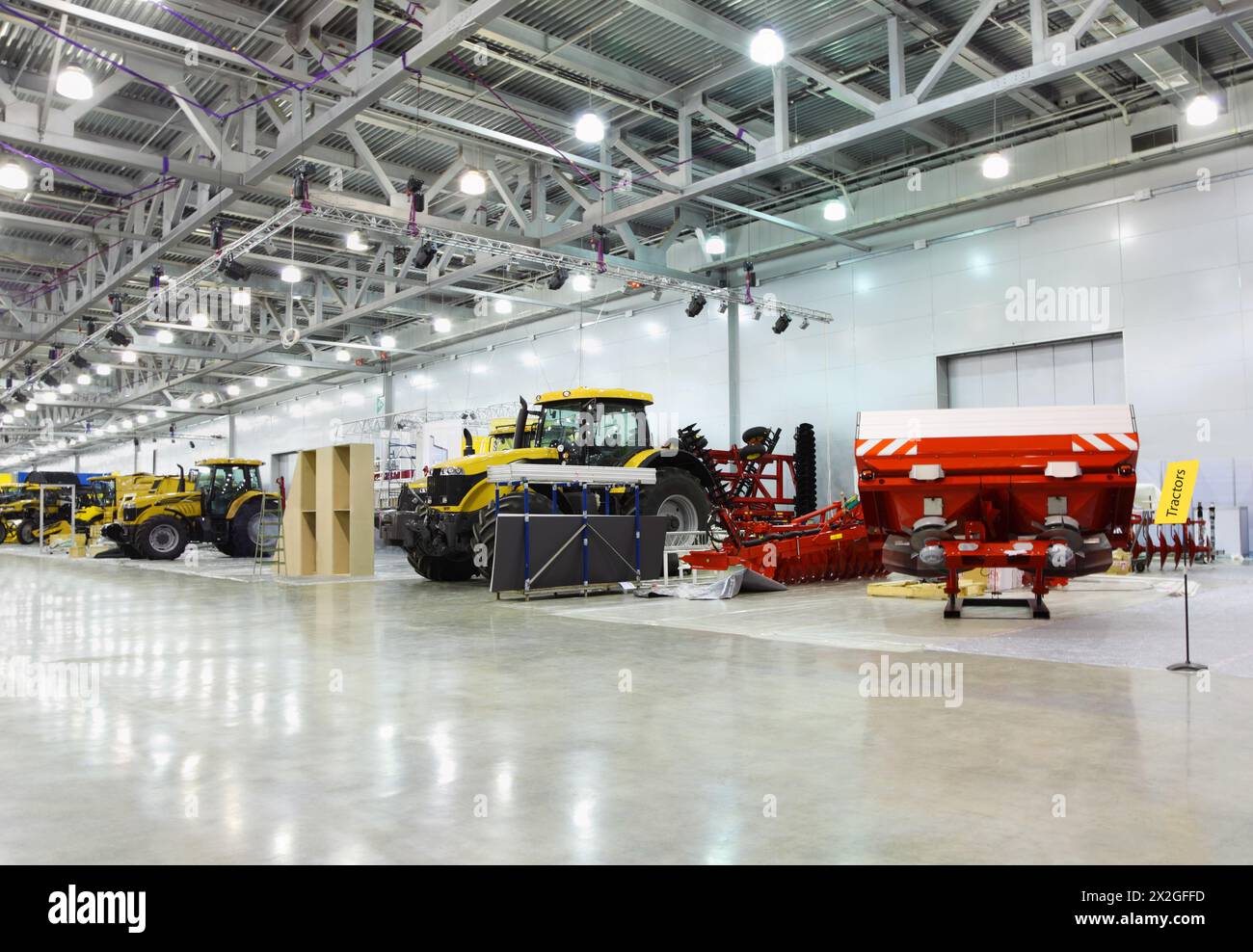 Big tractors are in room at exhibition, special agricultural machines ...