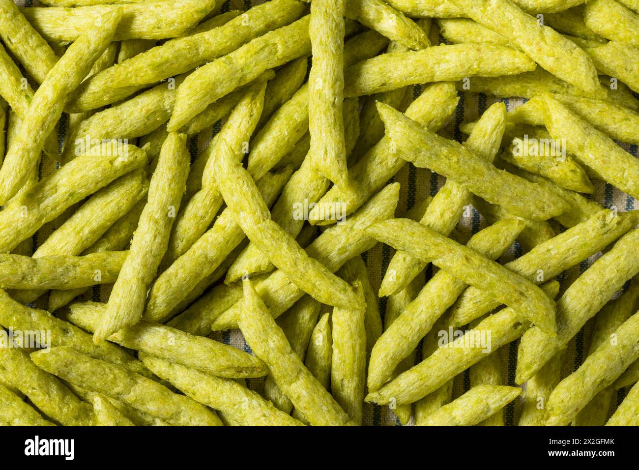 Fried Snap Pea Crisps Chips with Sea Salt Stock Photo - Alamy