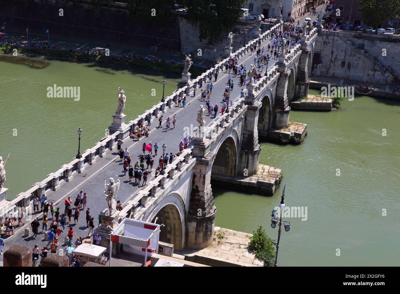 ROME - AUGUST 3: Tourists on Sant' Angelo Bridge on August 3, 2010 in ...