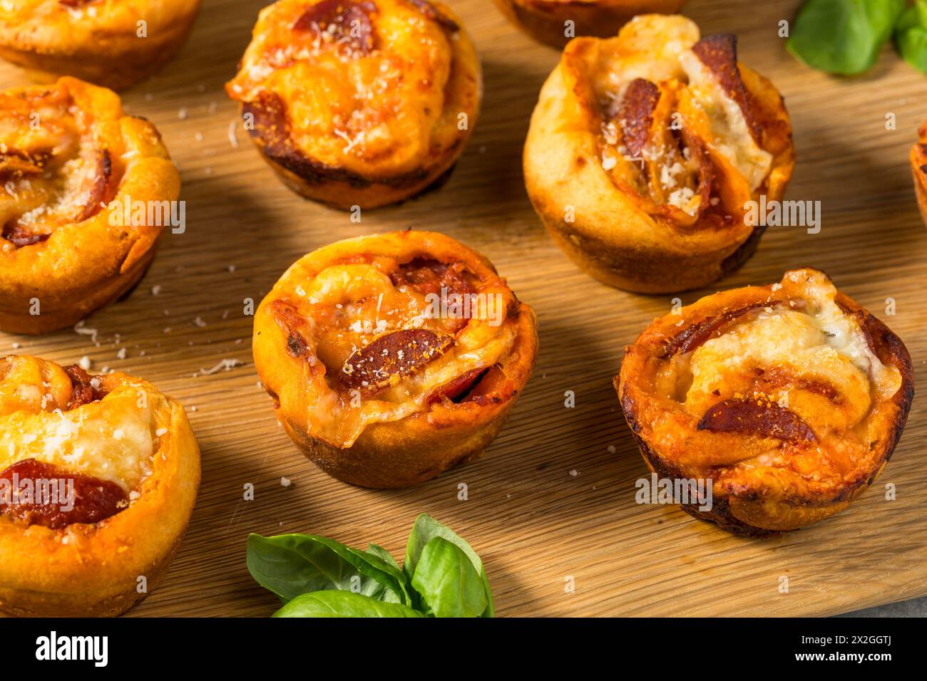 Homemade Italian Pizza Muffin Bites with Sauce and Pepperoni Stock ...