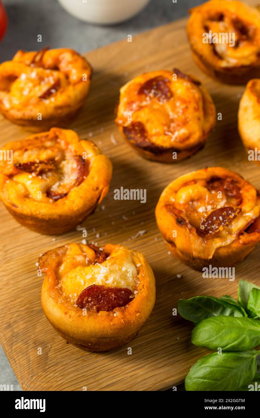 Homemade Italian Pizza Muffin Bites with Sauce and Pepperoni Stock ...