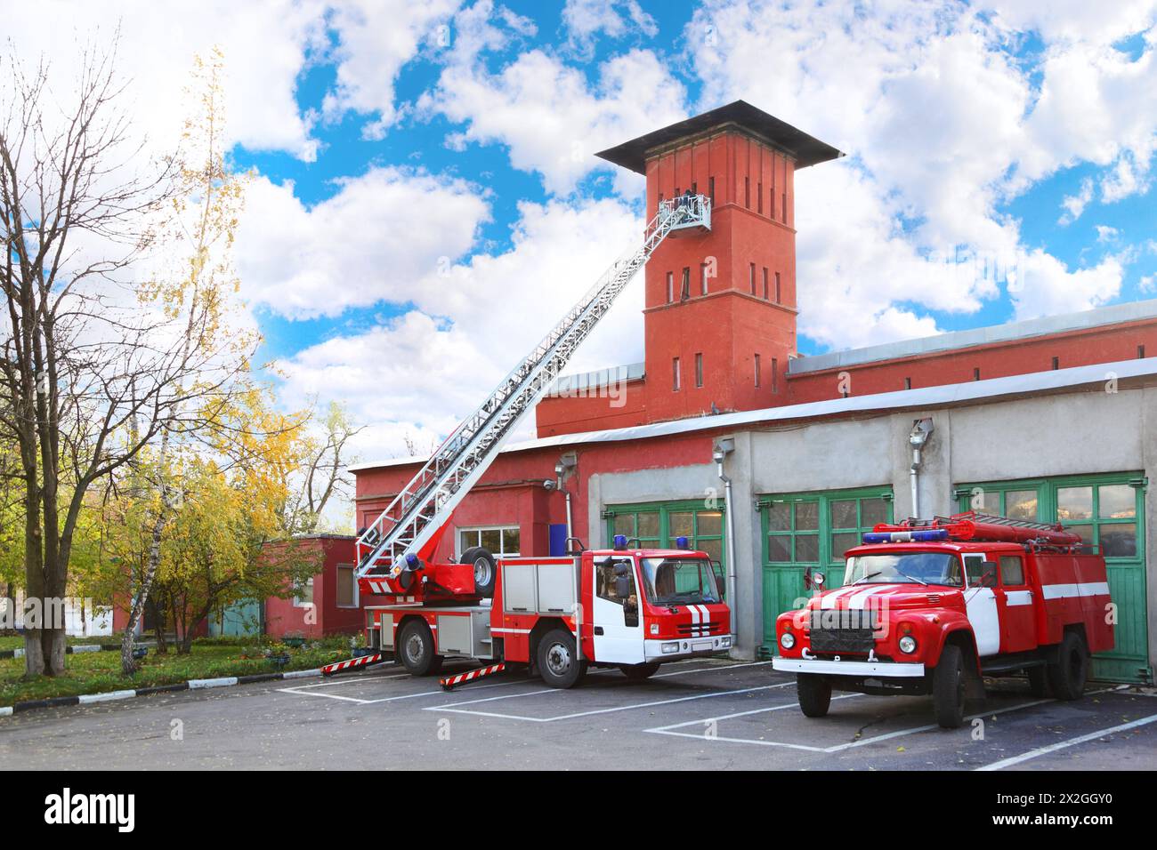 fire station, two red fire truck with long ladder, red high tower Stock ...
