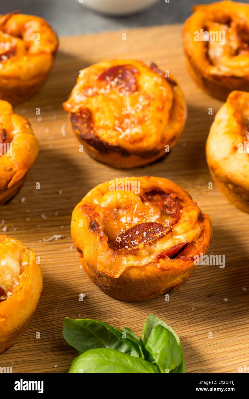 Homemade Italian Pizza Muffin Bites with Sauce and Pepperoni Stock ...