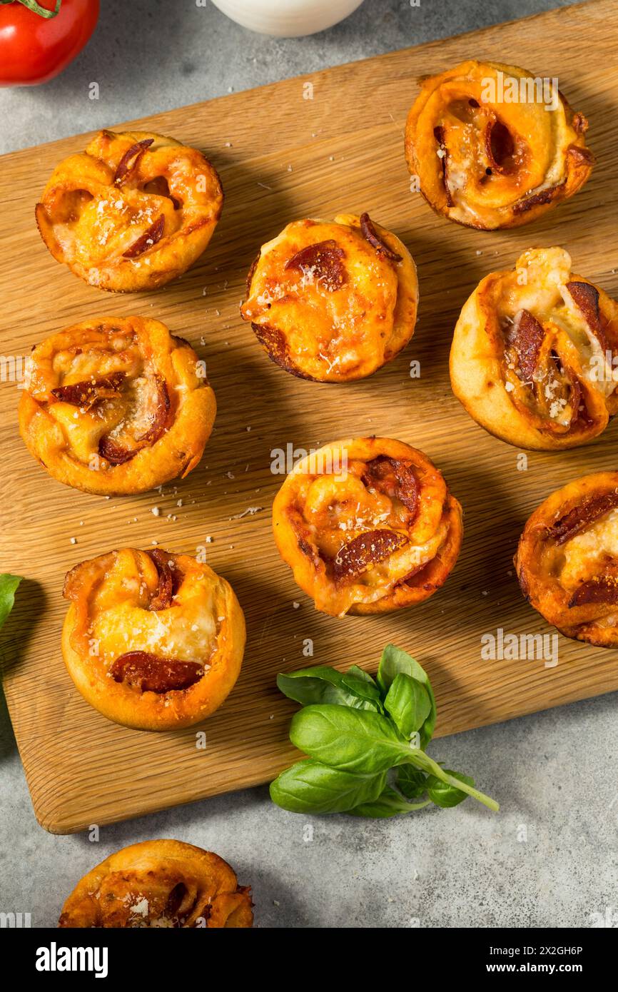 Homemade Italian Pizza Muffin Bites with Sauce and Pepperoni Stock ...
