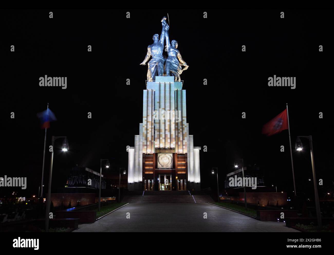 Worker and Collective Farm monument in Moscow at night, hammer and ...