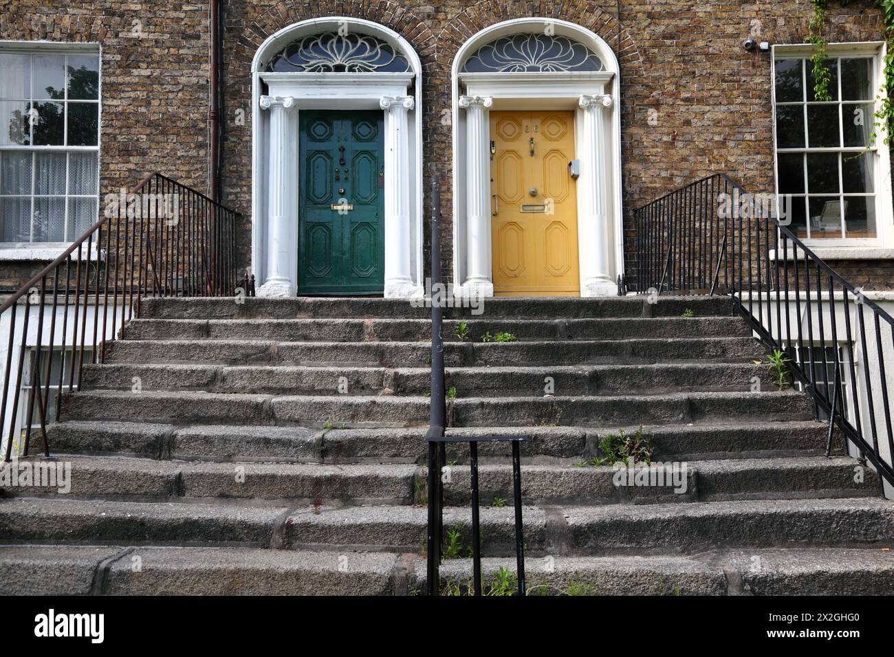 first floor and entrance to beautiful building, two doors and staircase ...