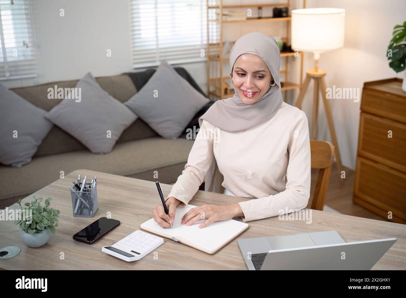Young muslim business woman calculate budget money finance. Muslim ...