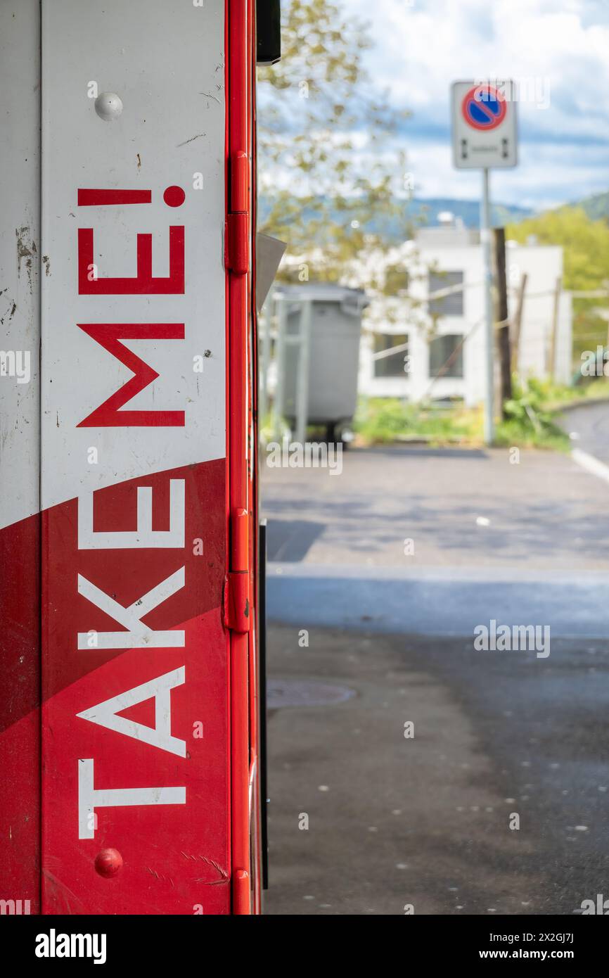 Zurich, Switzerland - April 20, 2024: Take me - sign on the snack ...