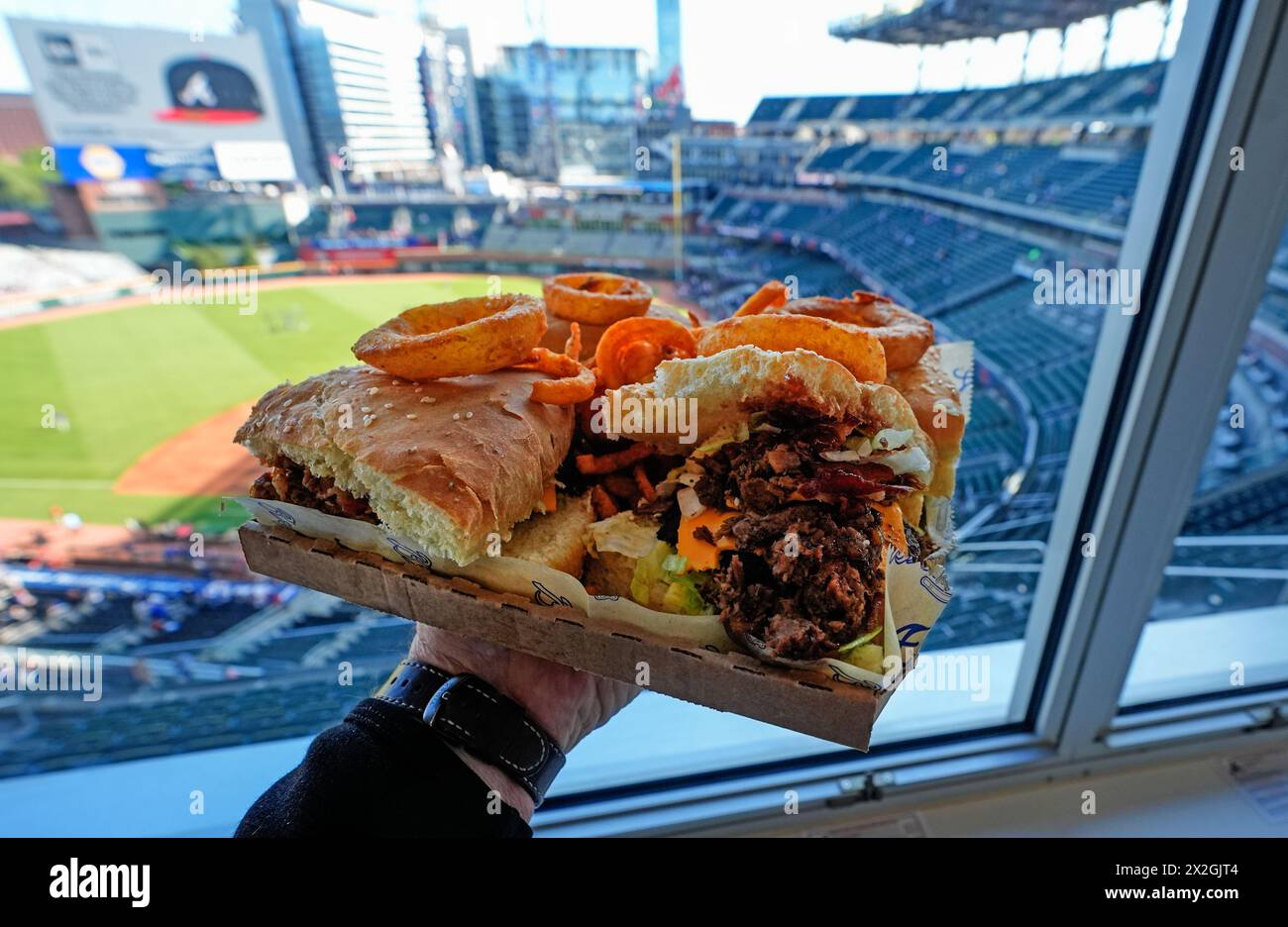 A Four Bagger hamburger is shown at Truist Park before a baseball game ...