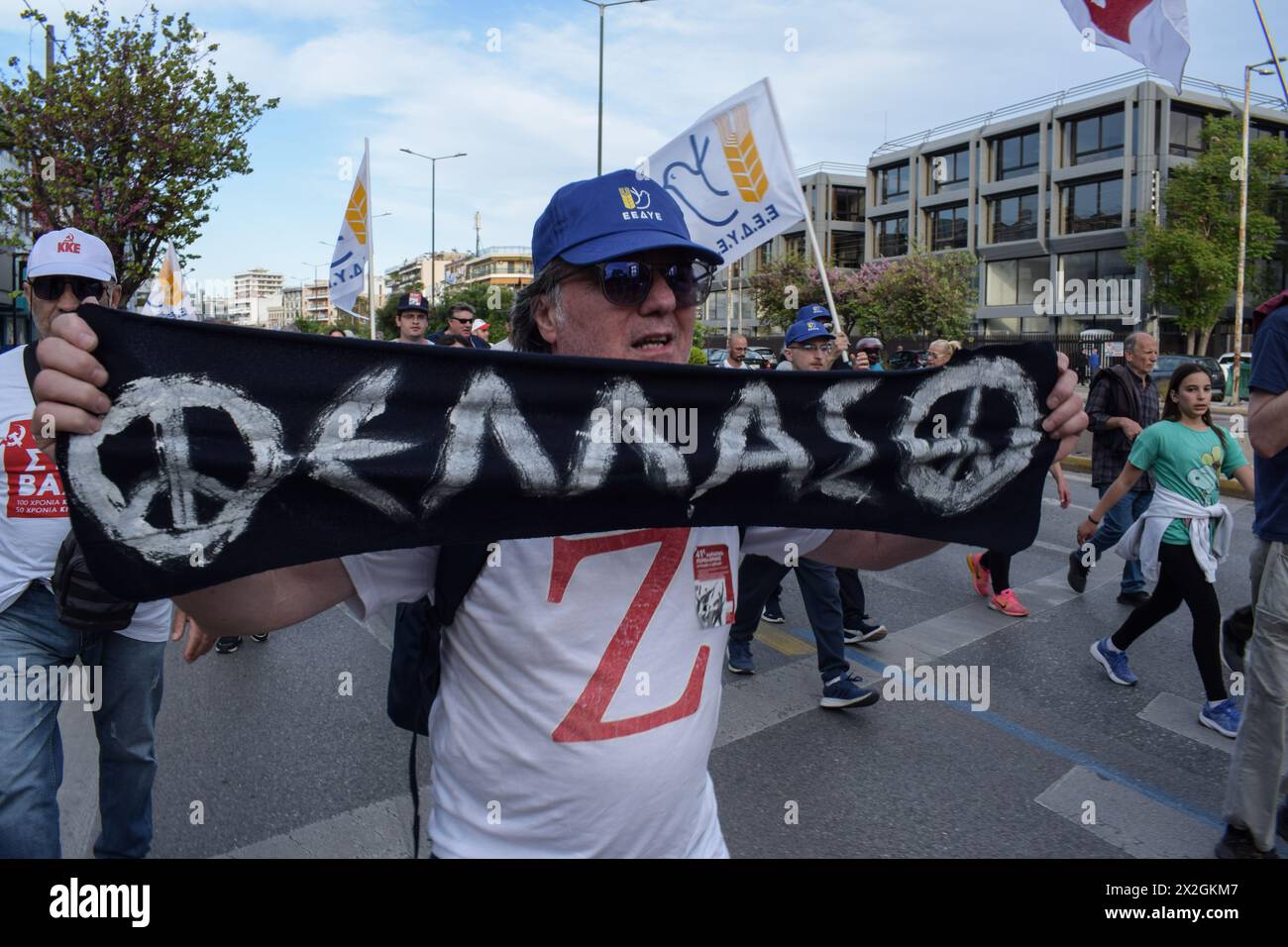 Athens, Greece. 21 April 2024. A Peace Marathon protestor marches ...