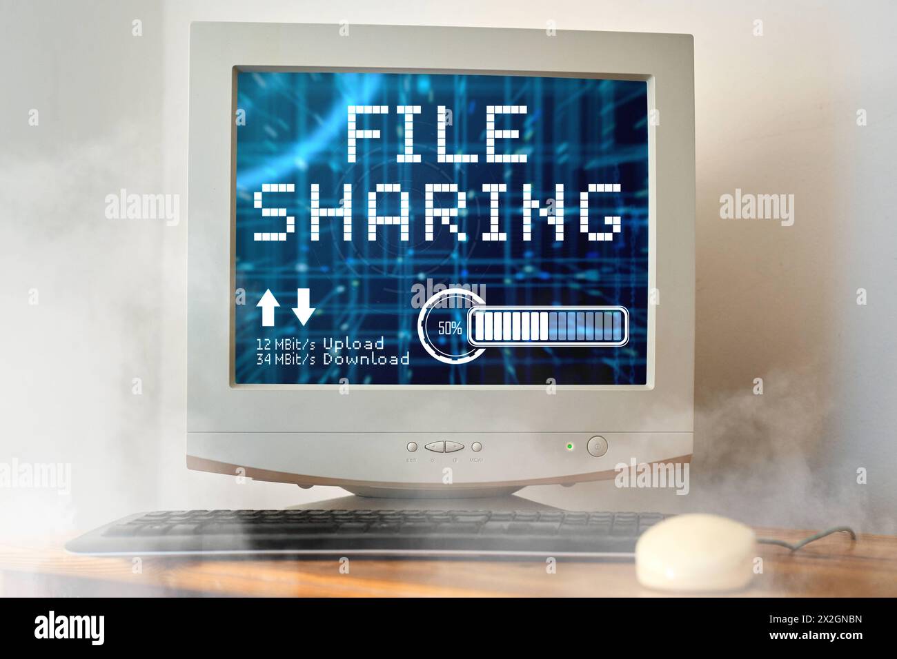April 22, 2024: Symbolic photo file sharing. An old computer with file ...