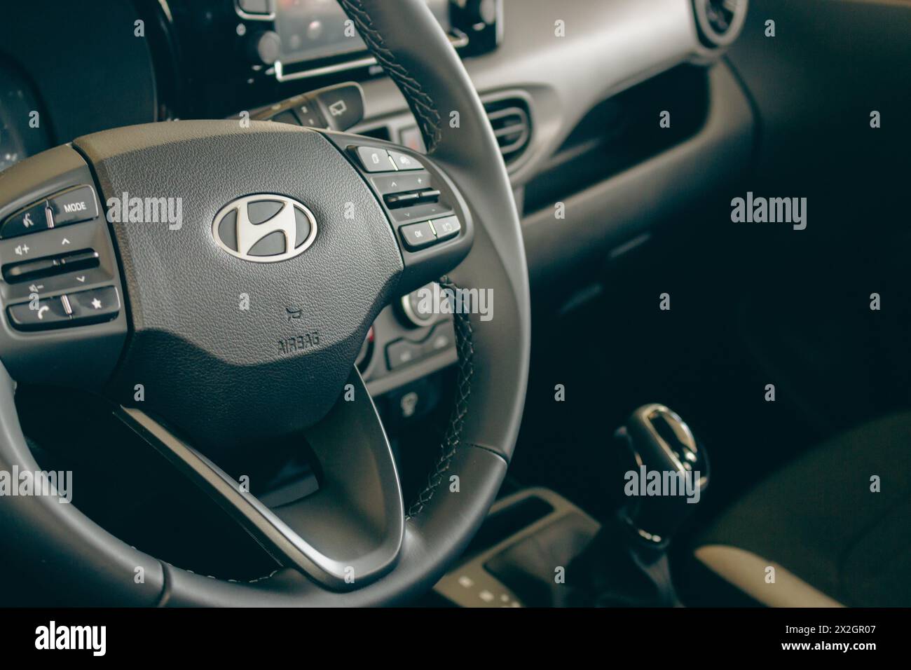 Car interior with logo Hyundai. New car steering wheel. Elegant classic ...
