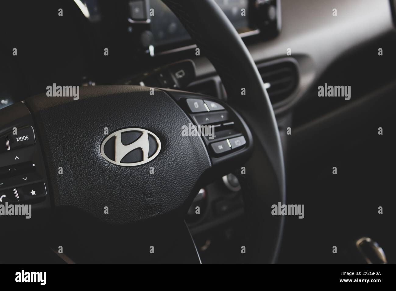 Car interior with logo Hyundai. New car steering wheel. Elegant classic ...