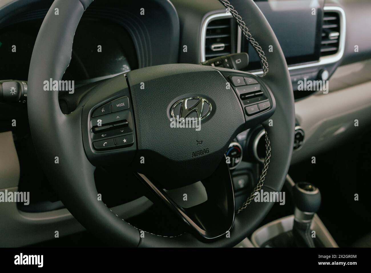 Car interior with logo Hyundai. New car steering wheel. Elegant classic ...