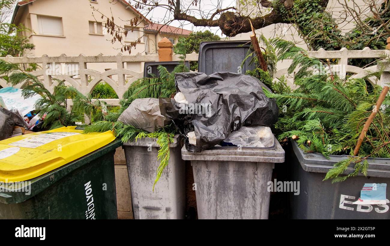 Poorly sorted trash cans, Bron, France Stock Photo - Alamy