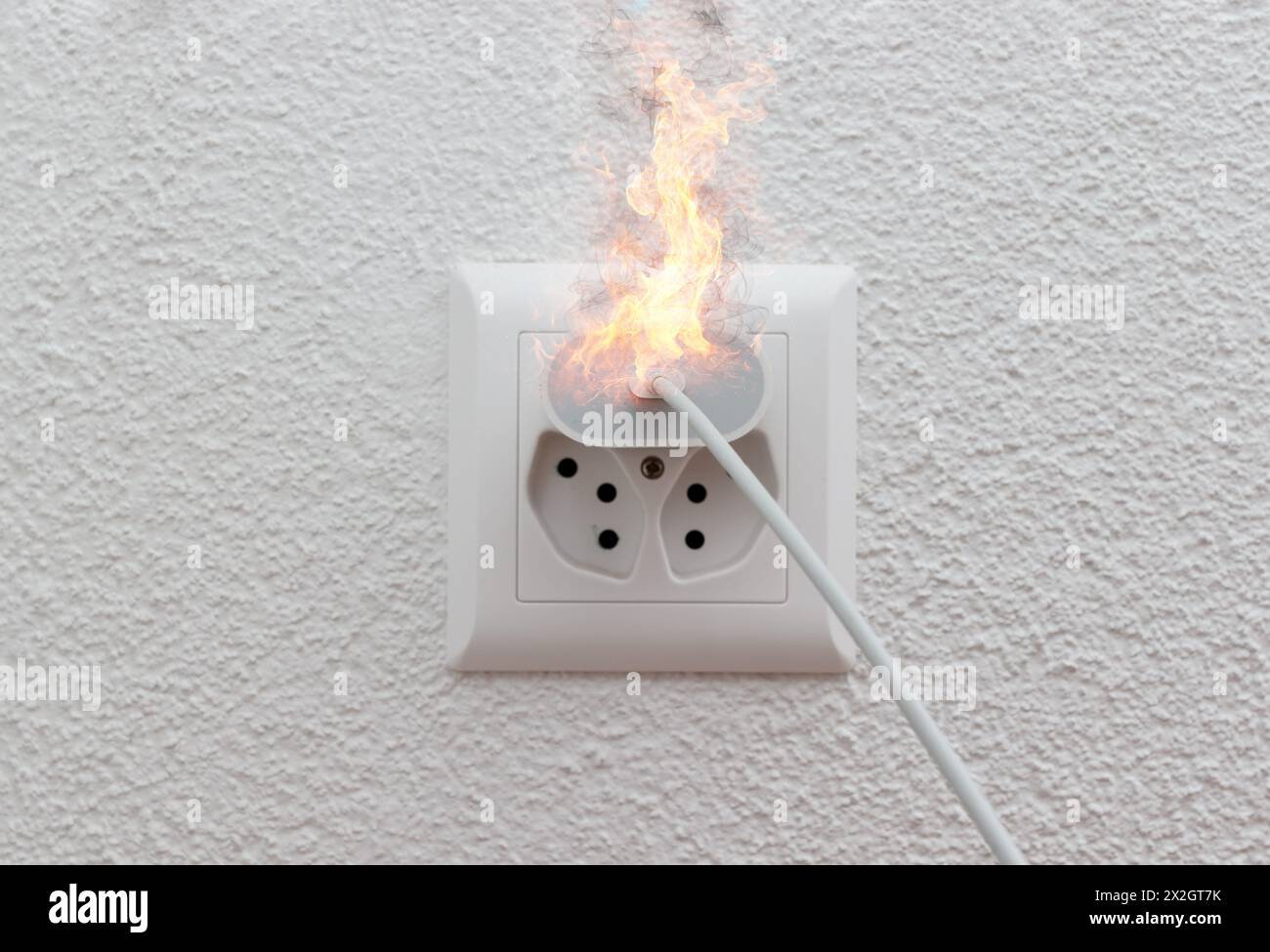 Socket or wire plug malfunction burning phone charger in indoor ...