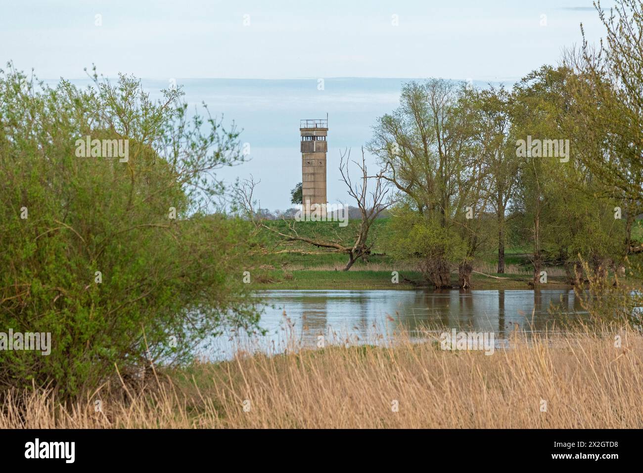 Former GDR watchtower, East Germany, trees, reed, water, River Elbe ...