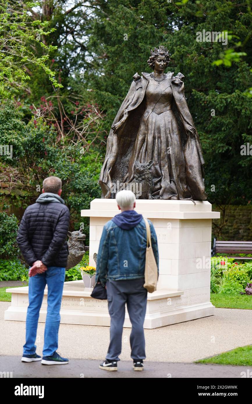 A statue of the late Queen Elizabeth II, the first to be commissioned ...