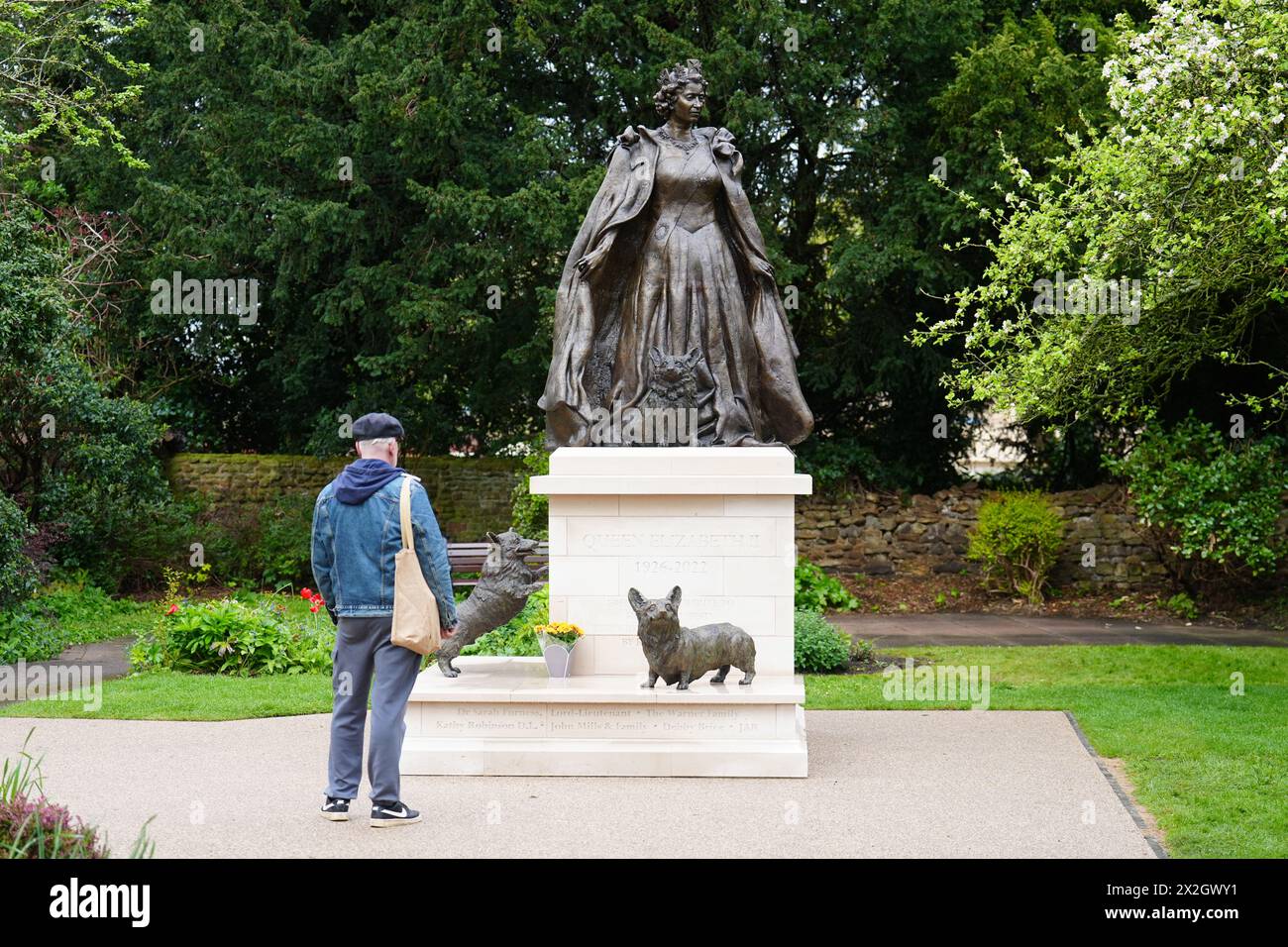 A statue of the late Queen Elizabeth II, the first to be commissioned ...