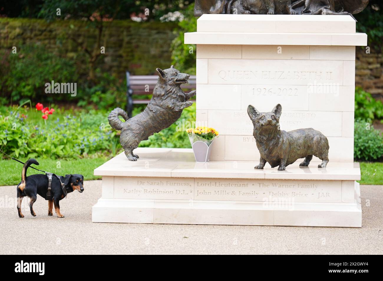 A statue of the late Queen Elizabeth II, the first to be commissioned ...