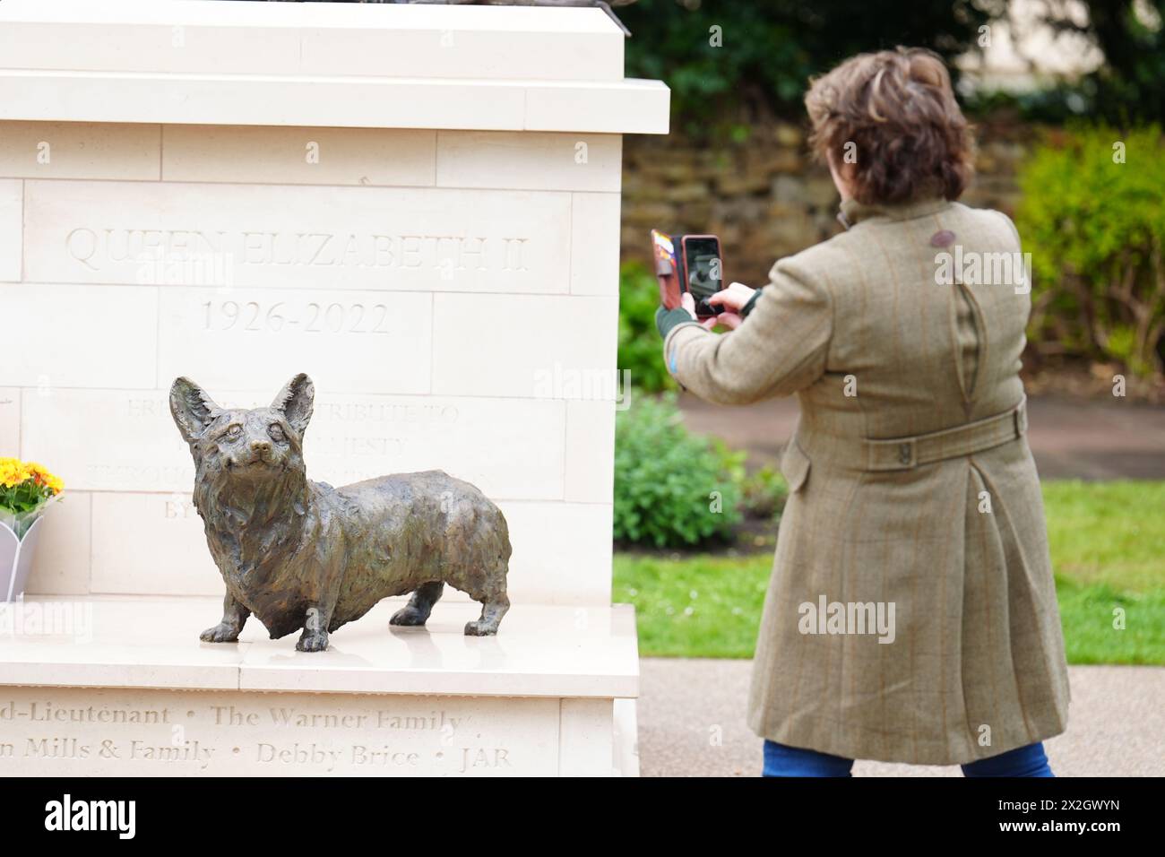 A statue of the late Queen Elizabeth II, the first to be commissioned ...